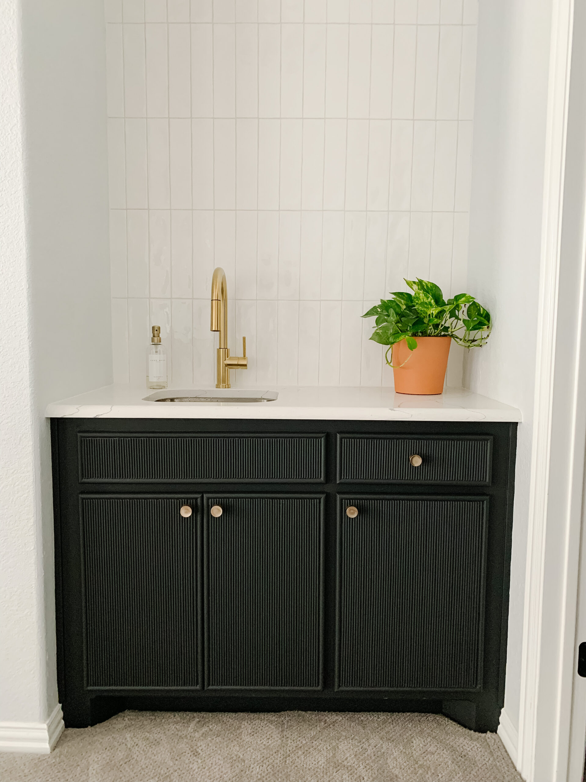 Reeded Cabinet DIY with Dowels - texasdiymama.com